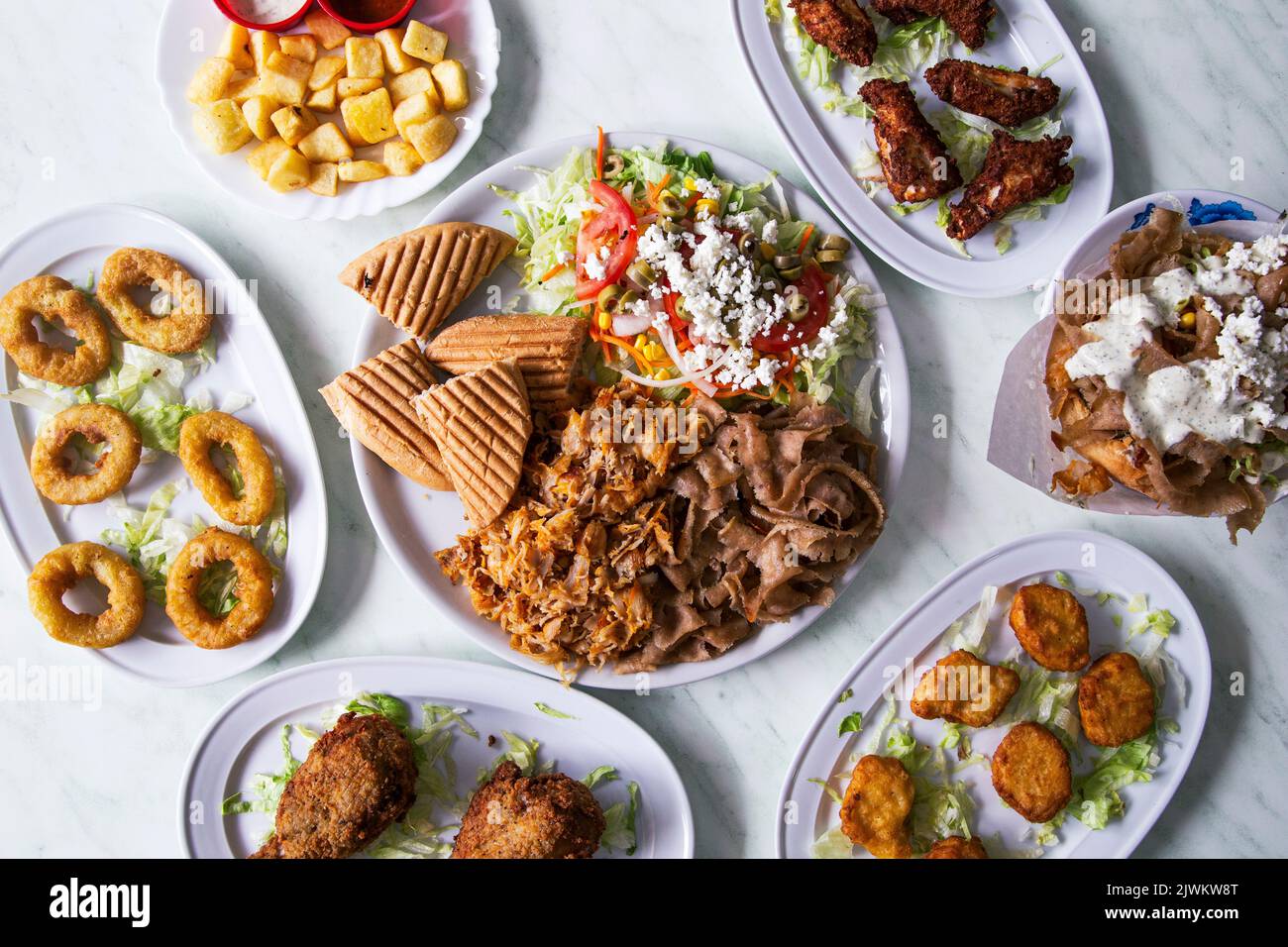 Top view of variety of Pakistani fast food dishes Stock Photo - Alamy