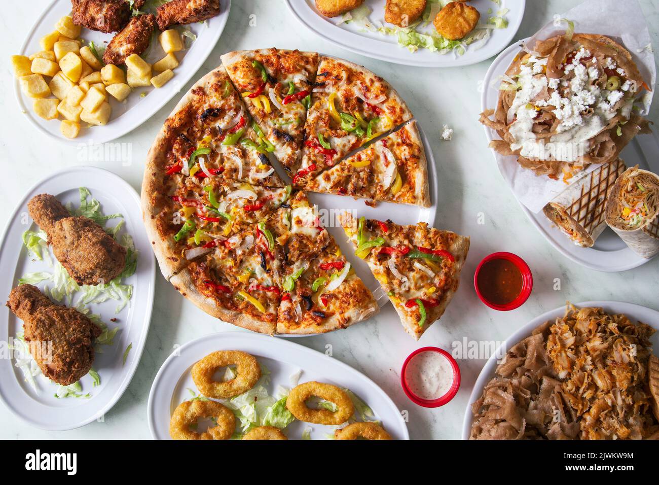 Top view of Pizza doner, variety of dishes of Asian origin Stock Photo ...