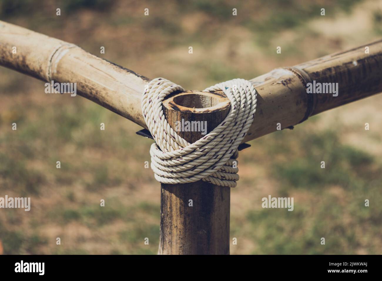 Old rope tied wooden pole hi-res stock photography and images - Alamy