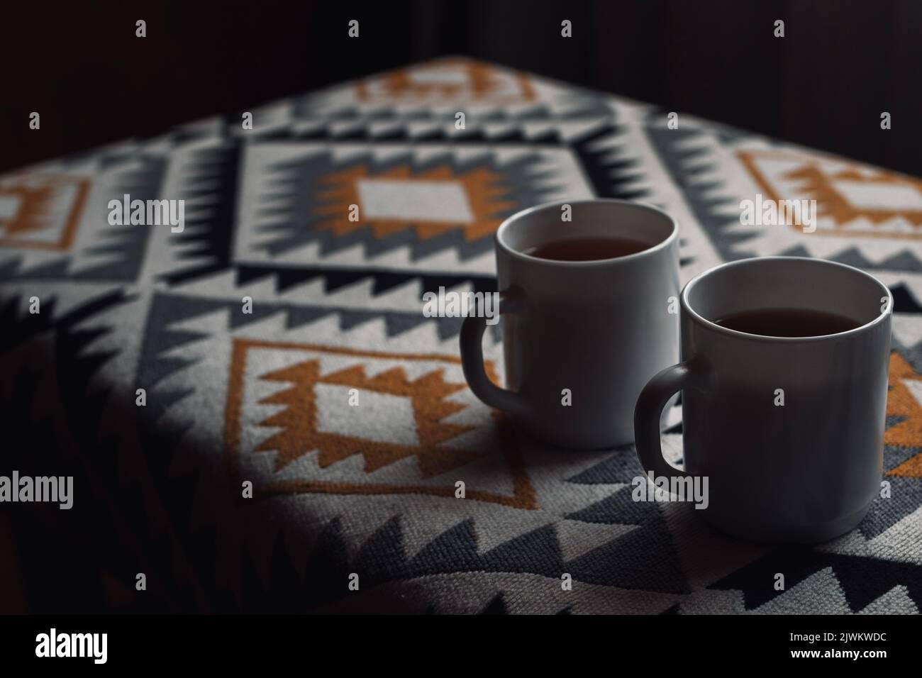 Two cups of tea on table inside the wooden house Stock Photo - Alamy