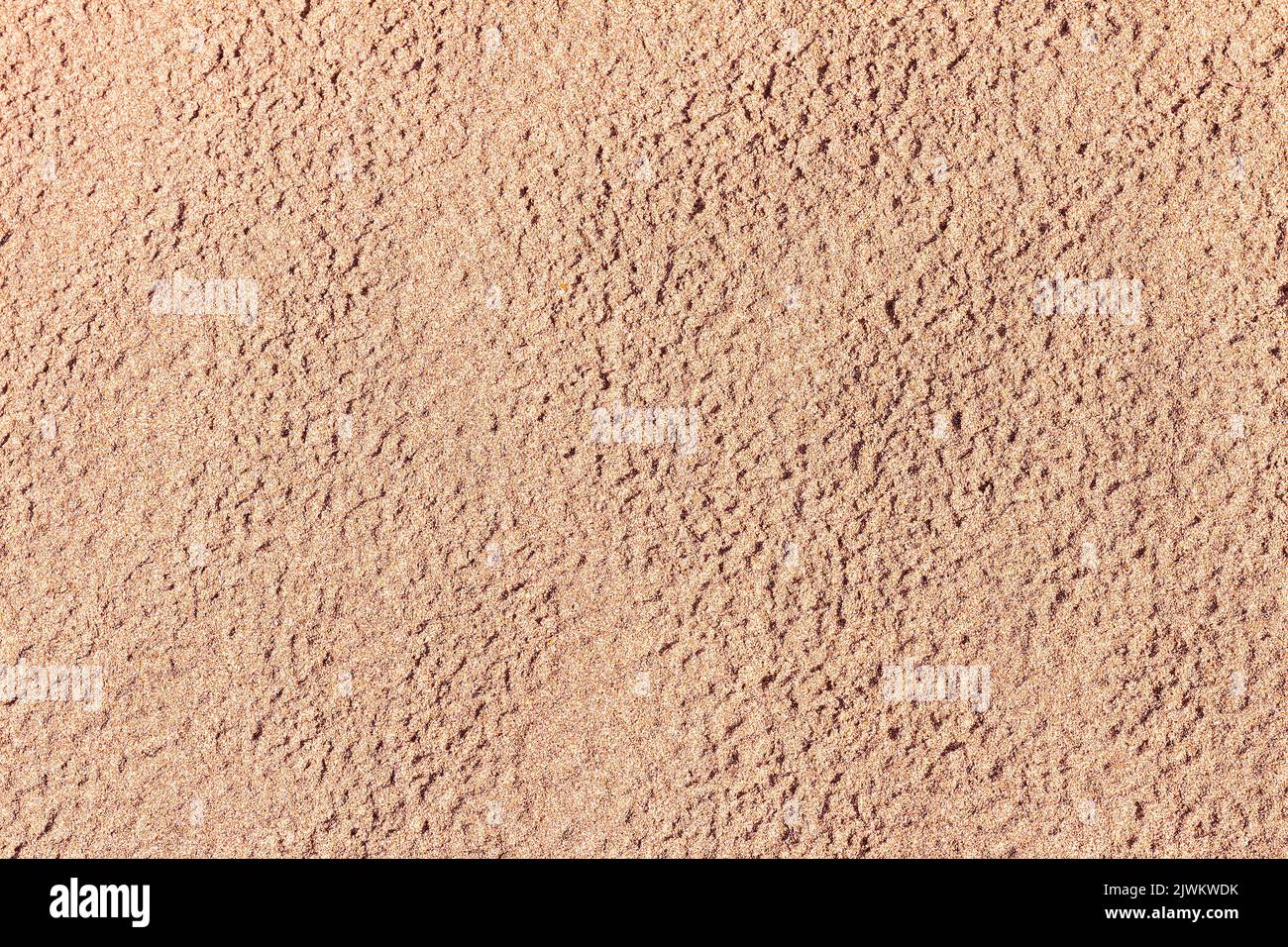 Horizontal shot of Abstract painted concrete orange wall background and ...