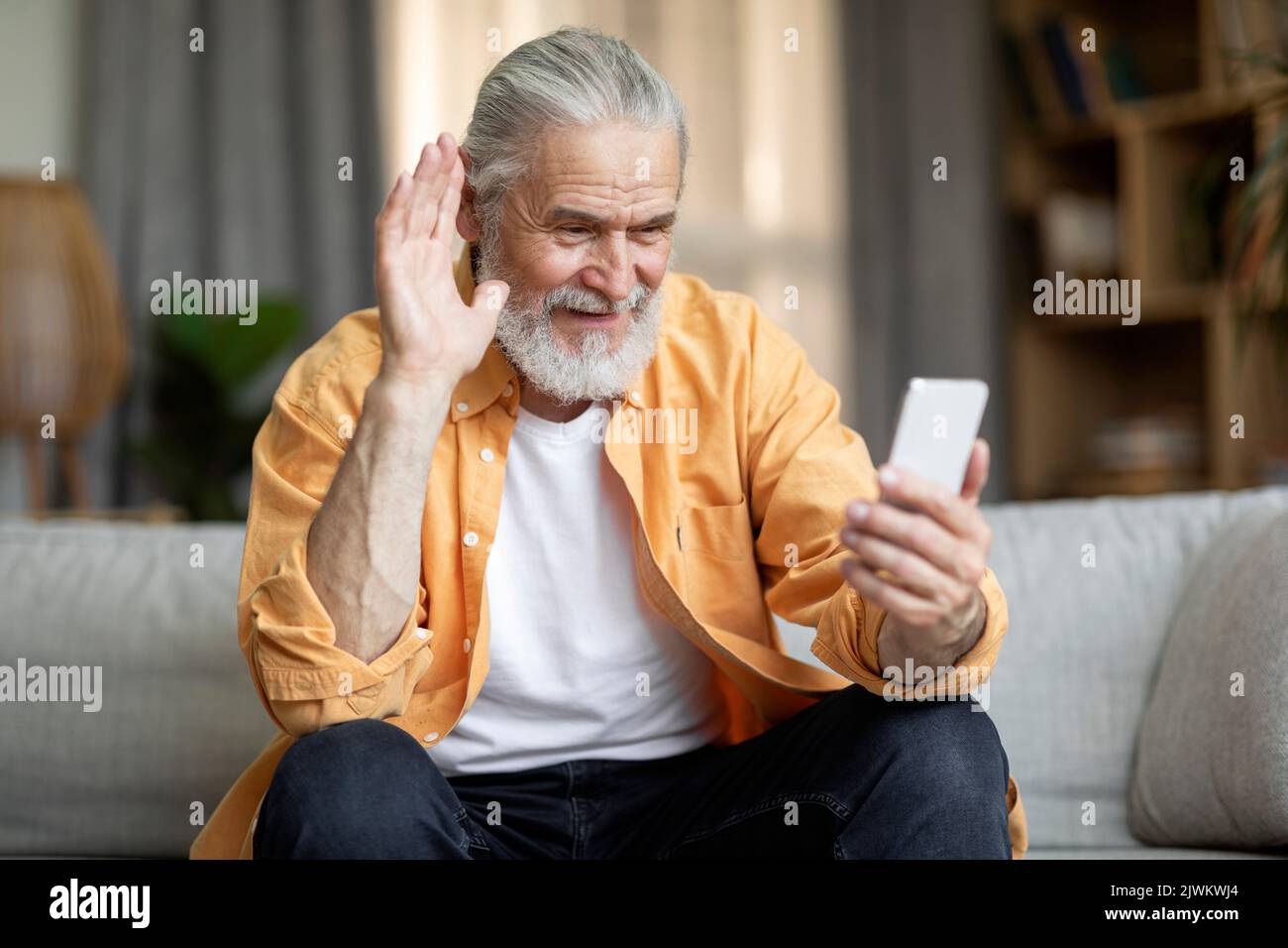 Elderly man having video call hi-res stock photography and images - Alamy