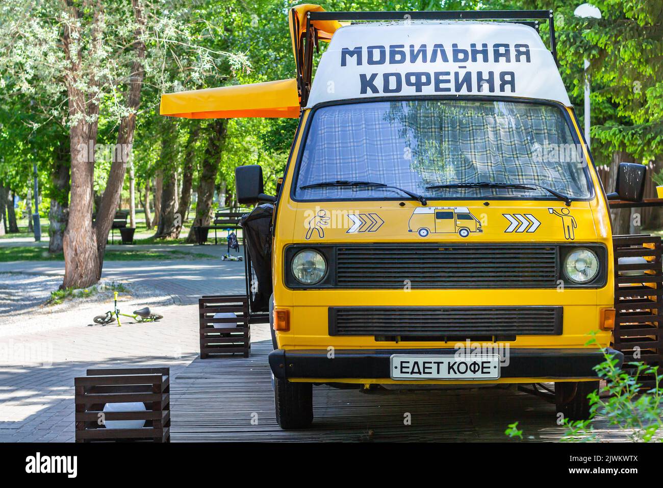 Food delivery. retro car van parked in park, selling coffee, Russia ...