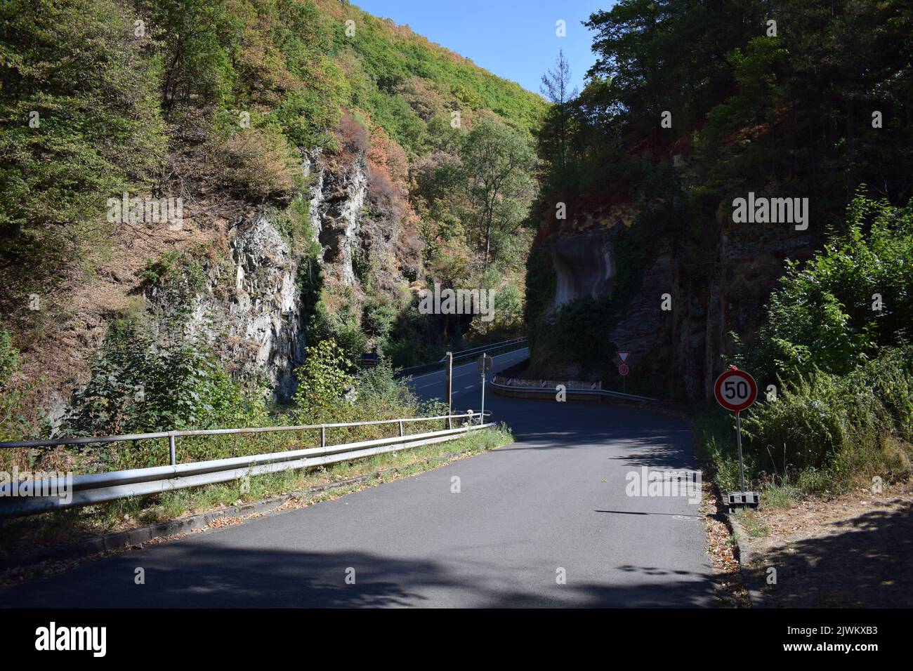 narrow road between cliffs Stock Photo - Alamy