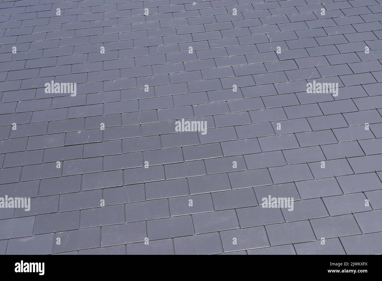 a black slate resin wall cladding Stock Photo - Alamy