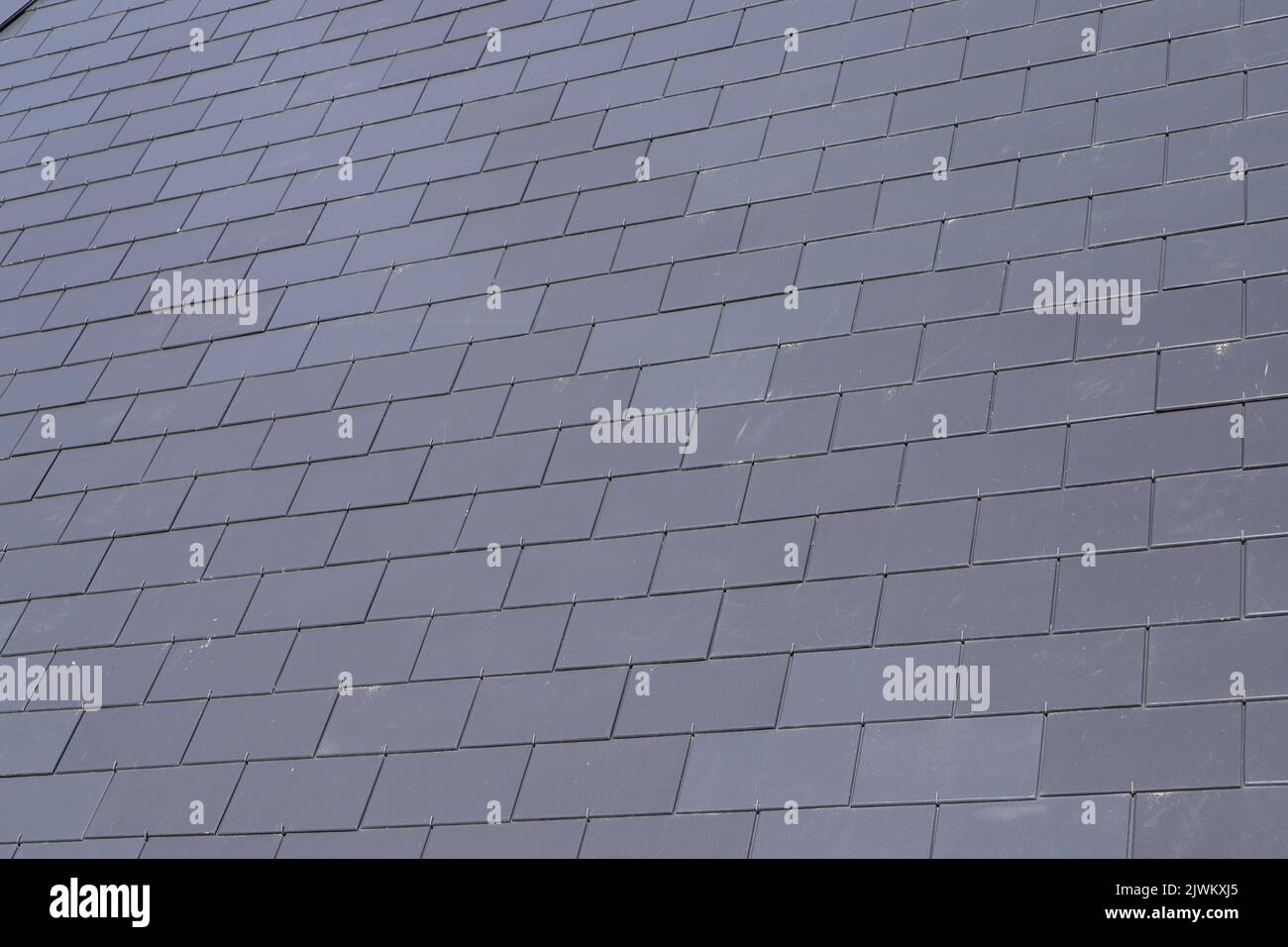 a black slate resin wall cladding Stock Photo - Alamy