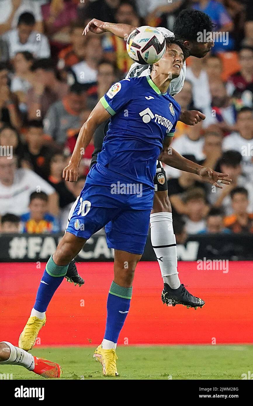 Valencia CF's Eray Comert (r) and Getafe CF's Enes Unal during La Liga match. September 4, 2022 ...
