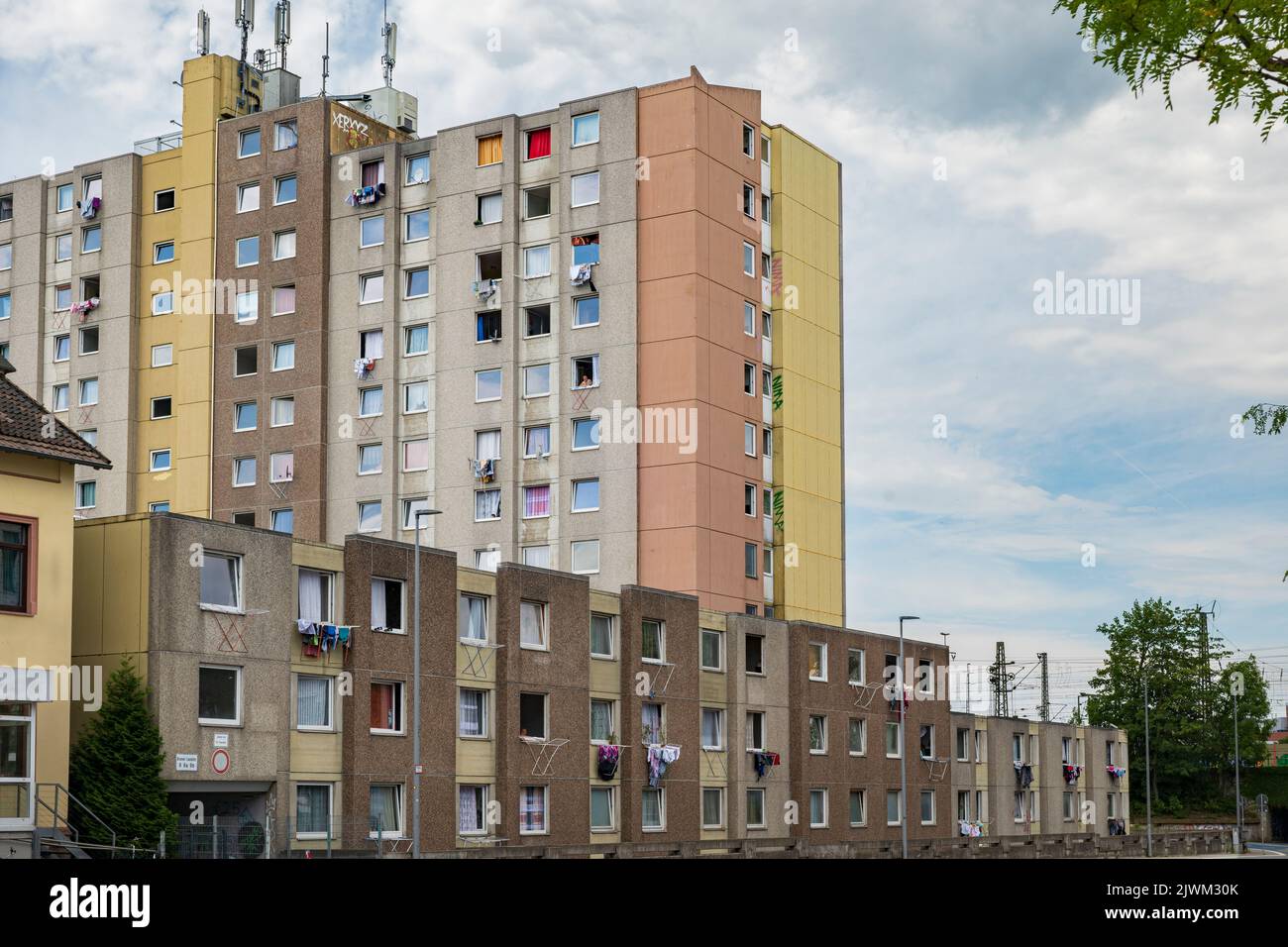 High-rise complex, walls hanging from the windows, social hotspot in ...