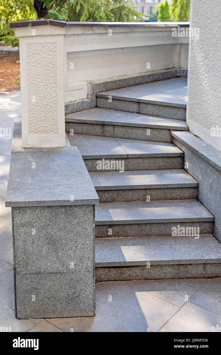 External Dark Granite Stone Stairs With White Fence Stock Photo - Alamy