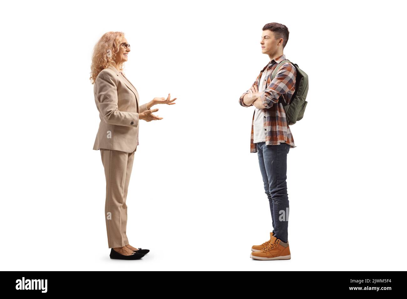 Full length profile shot of a woman standing and talking to a male ...