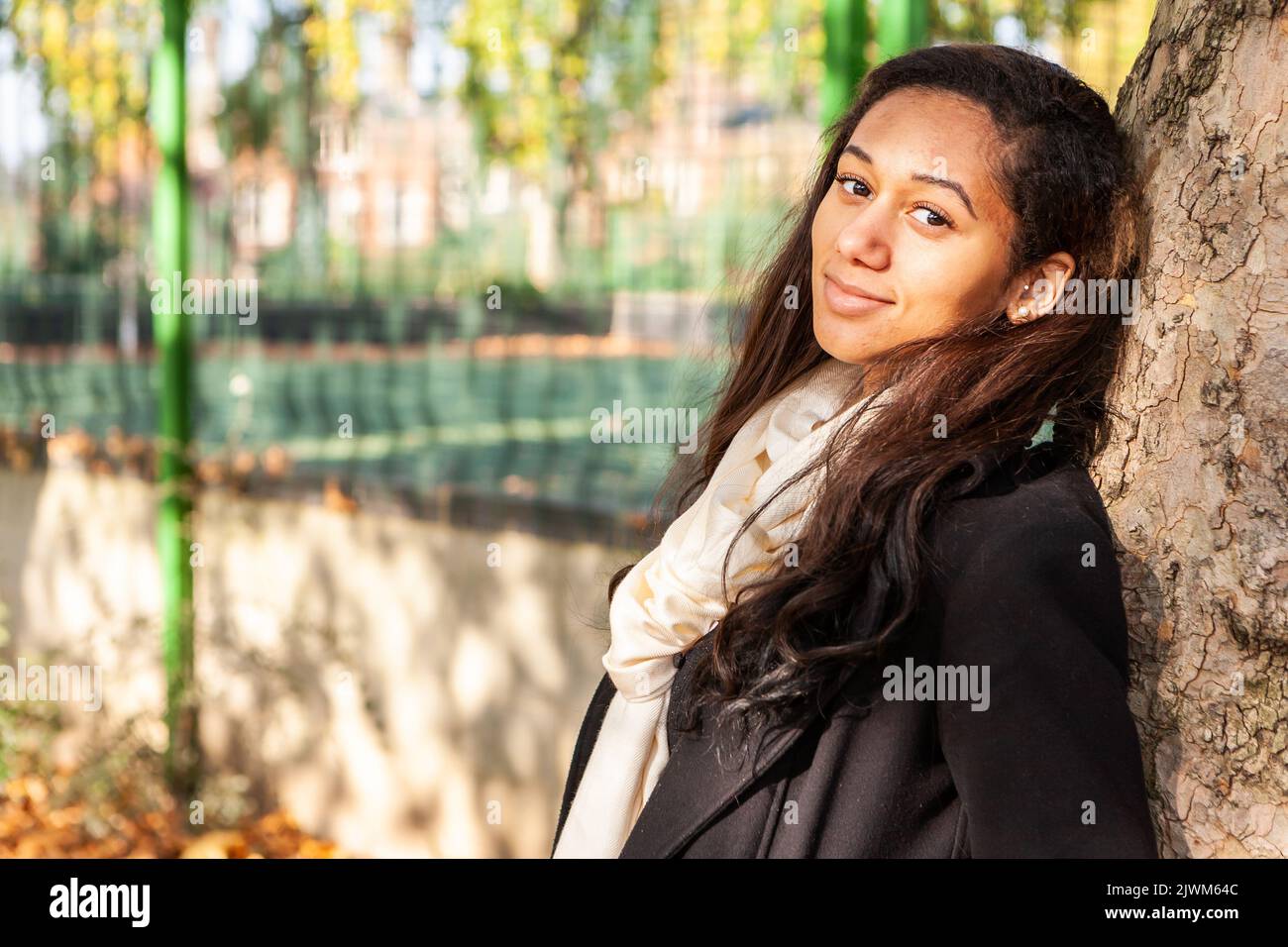 Teenage Students: A Friendly Face. A smiling teenage girl in a relaxed ...