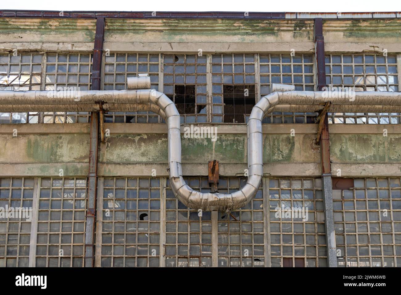 U Shape Bend Steam Pipe Line in Old Factory Stock Photo - Alamy