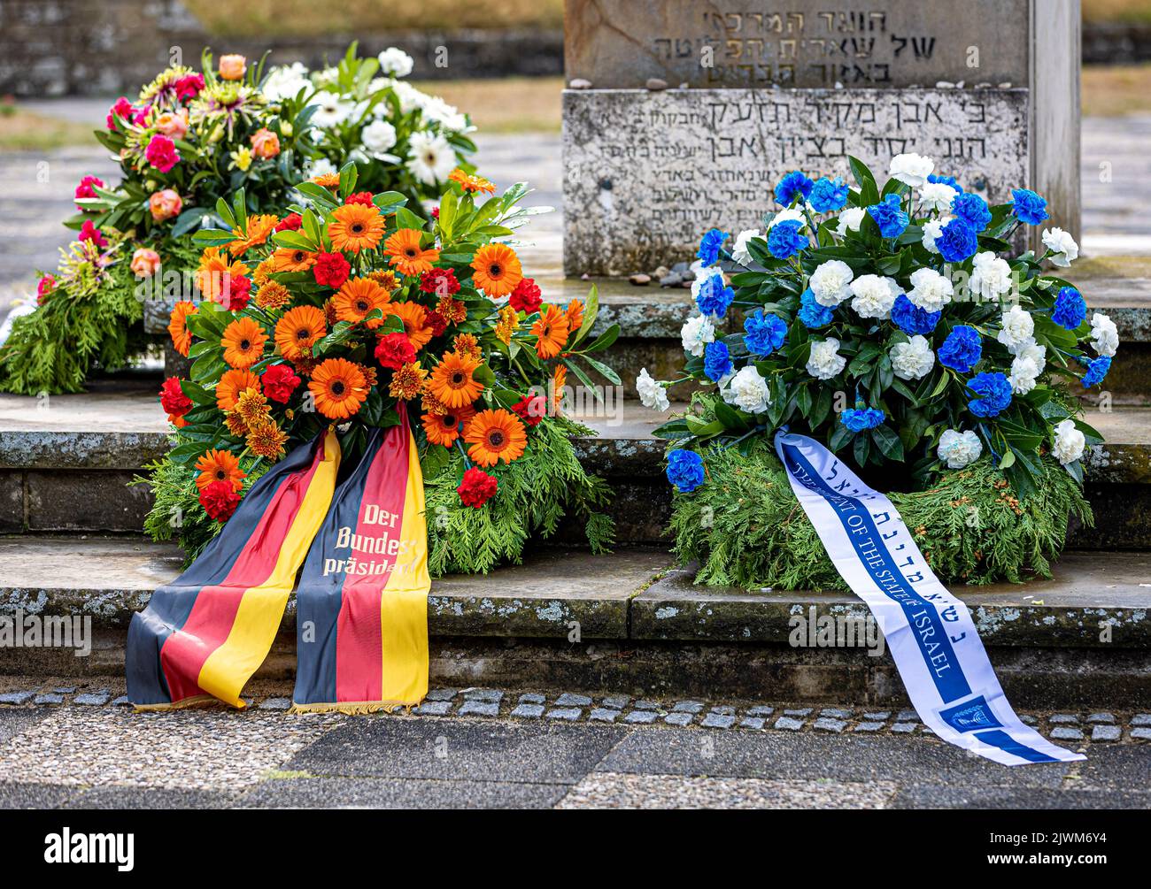 Lohheide, Germany. 06th Sep, 2022. Wreaths of flowers lie on the ...