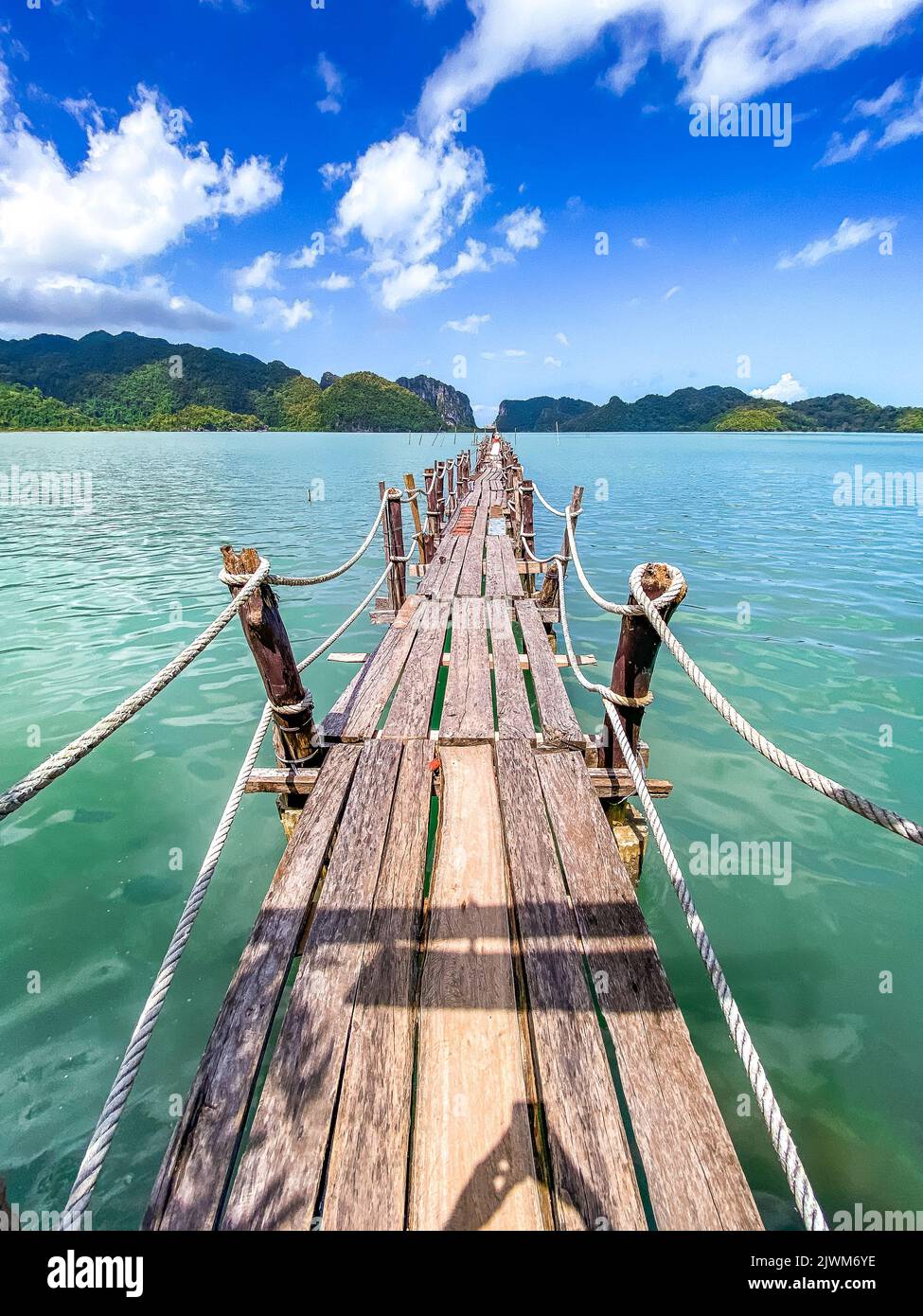 Wooden bridge at Ao Talet or Ta Lhet bay, Nakhon si Thammarat, Thailand ...