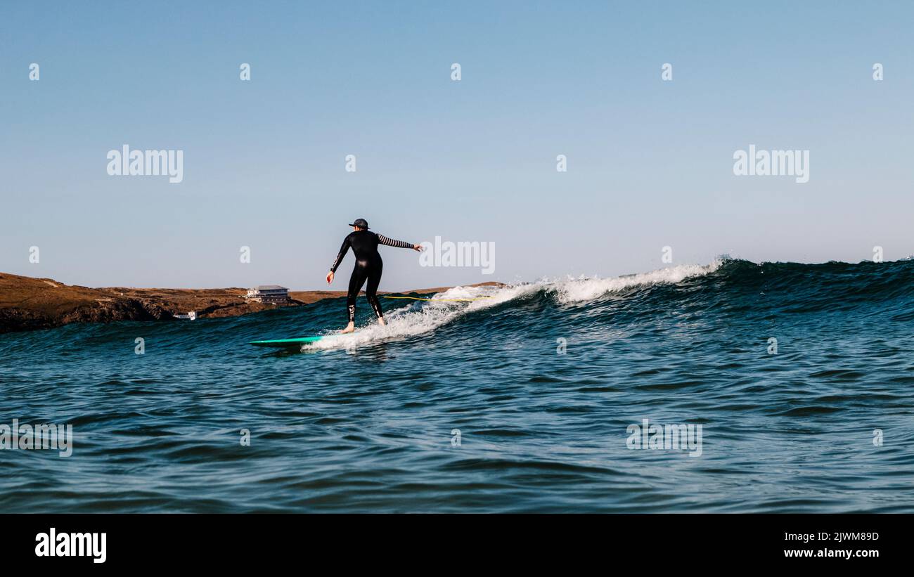 people surfing in Cornwall summer fun in the UK beginners to ...