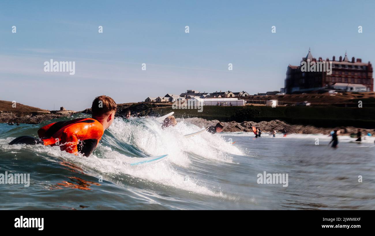 people surfing in Cornwall summer fun in the UK beginners to ...