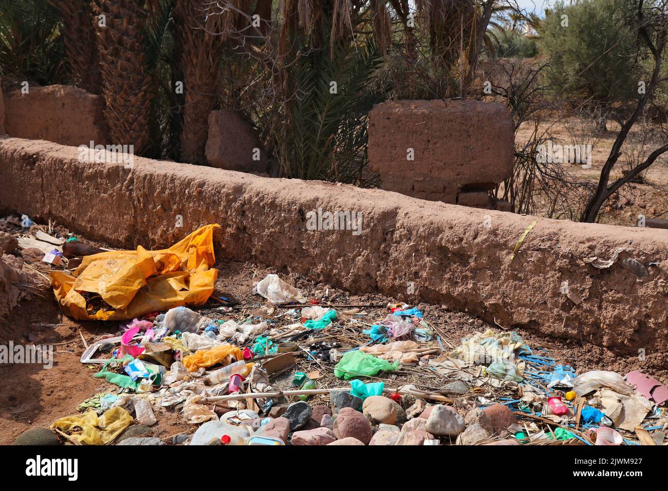 Garbage dumped on street side in Ouarzazate, Morocco. Domestic waste ...