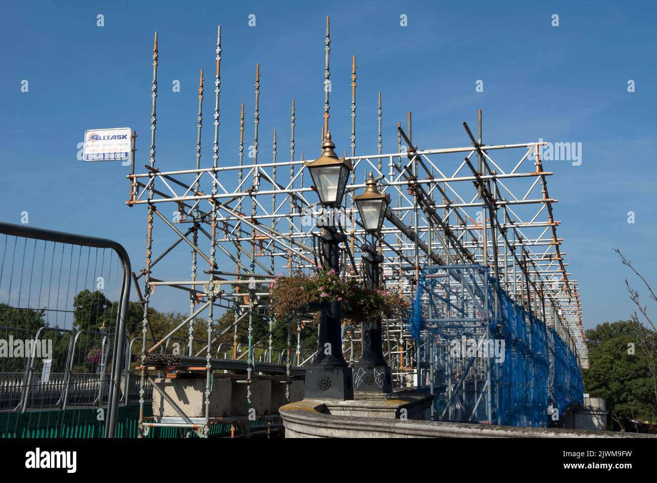 scaffolding mixing with victorian style street lamps on kingston bridge ...