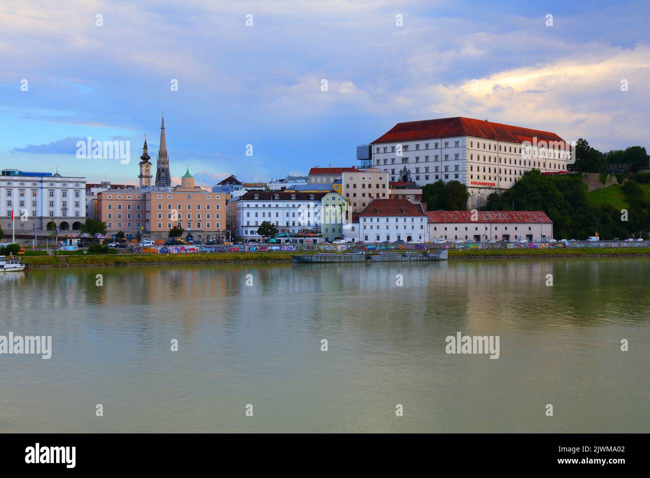 LINZ, AUSTRIA - AUGUST 1, 2022: Cityscape view with Danube River and ...