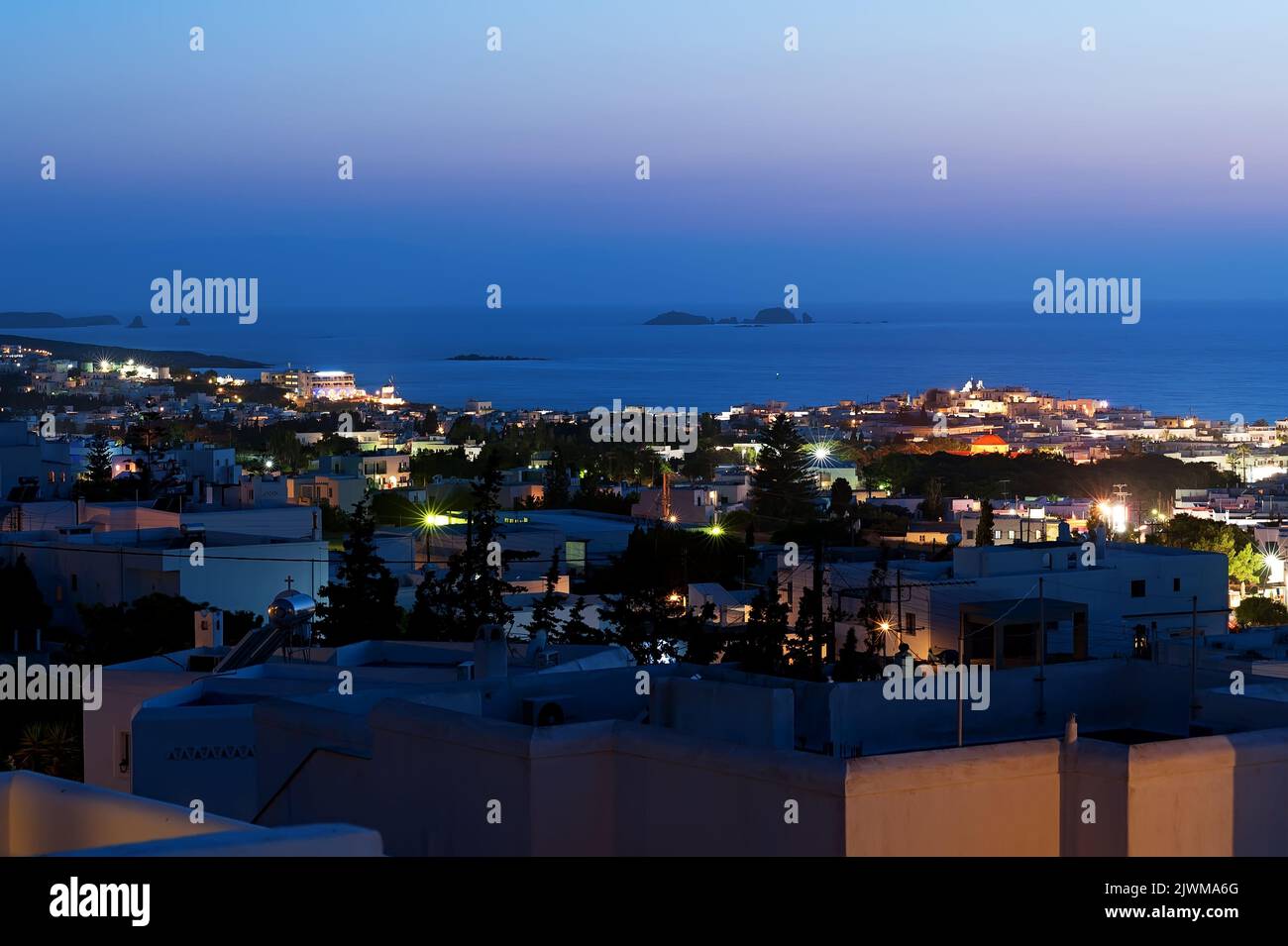 Night scene of village on Paros island, Greece Stock Photo - Alamy