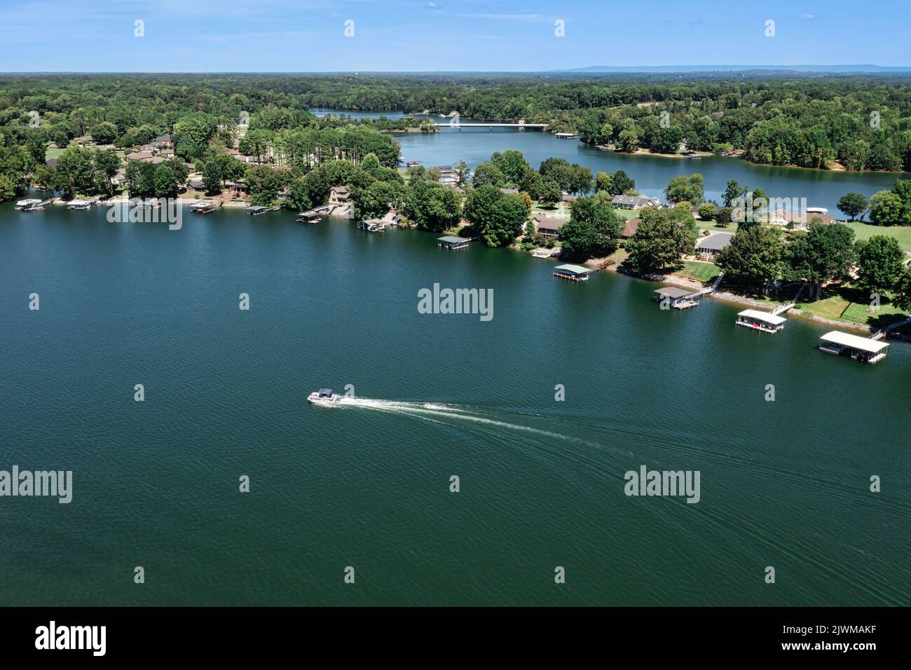 Aerial view of a pontoon boat on beautiful Tims Ford Lake in Tennessee ...