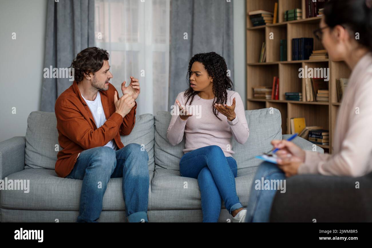Offended young international family quarreling at meeting with ...