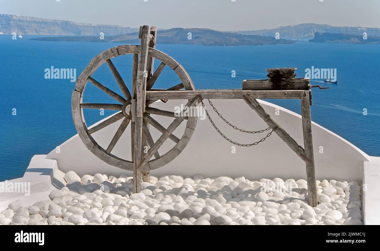 Spinning wheel in Oia, Santorini island, Greece Stock Photo - Alamy