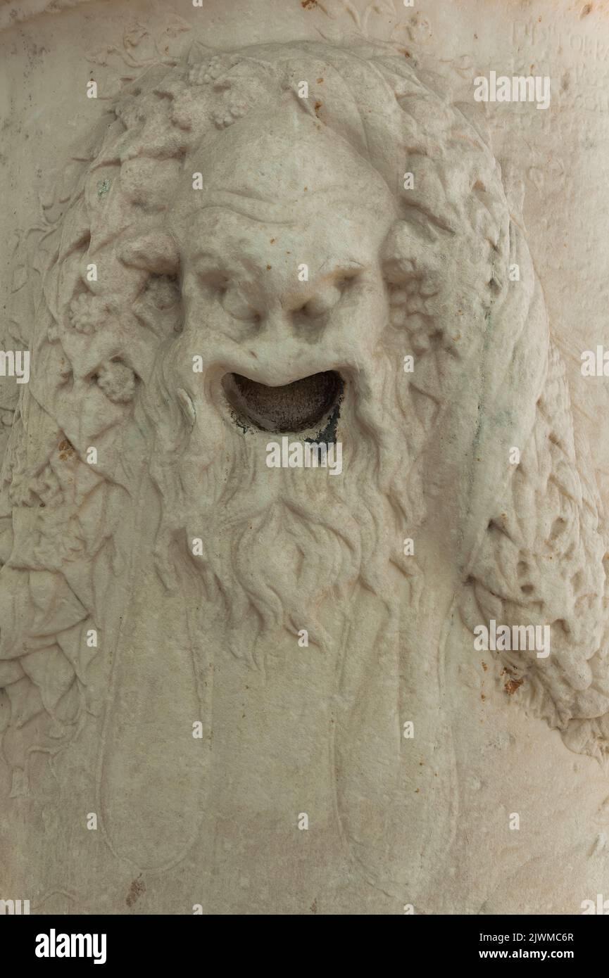 The face reliefs as street decorations in Athens, Greece Stock Photo ...