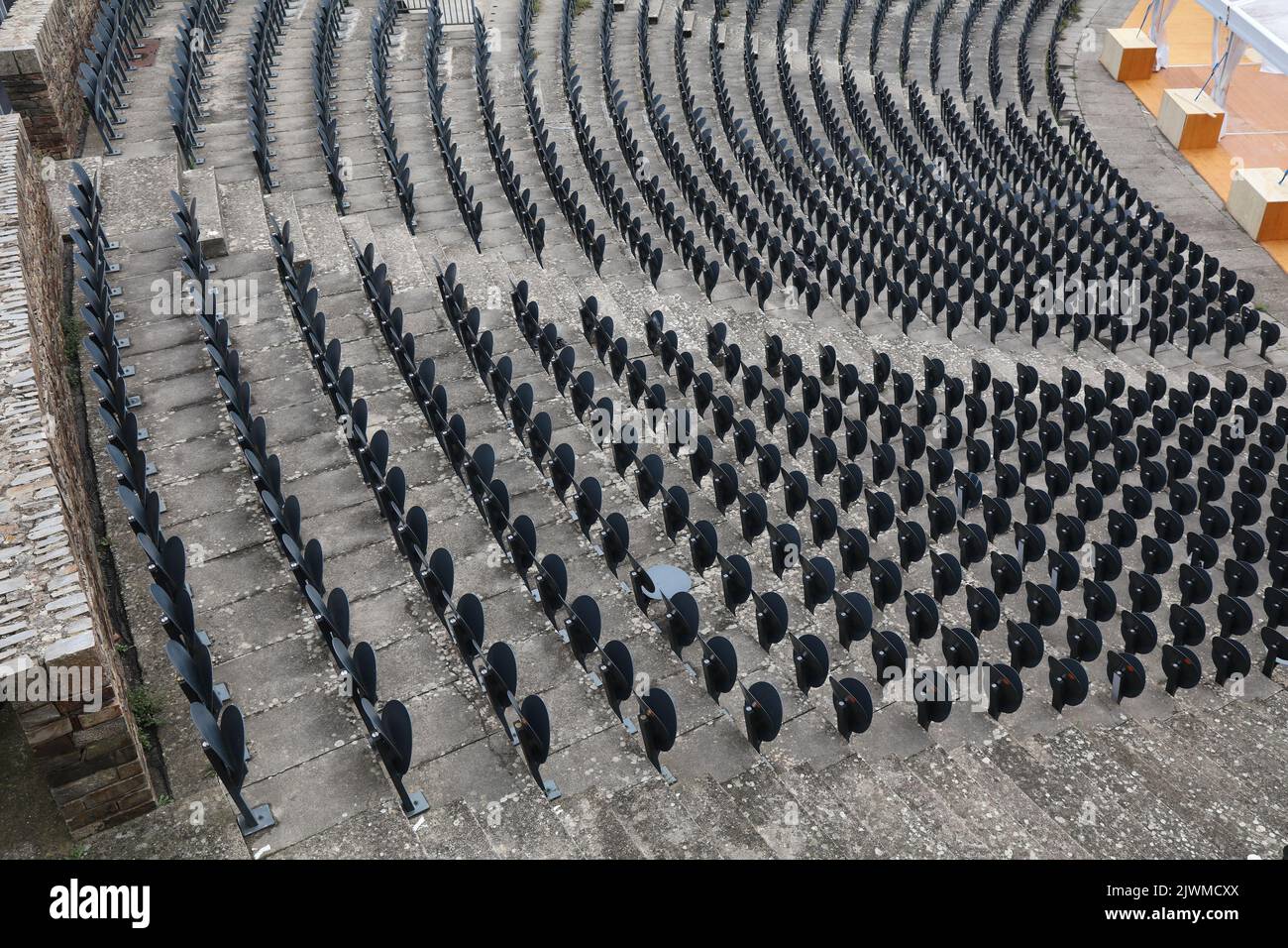 Audience seats - empty event venue in France. Grey plastic chairs Stock ...