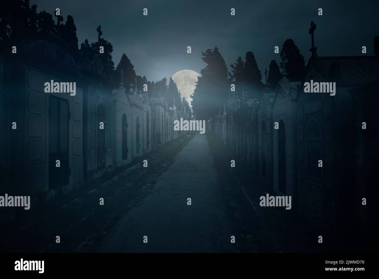 Spooky old european cemetery street in a full moon night Stock Photo ...
