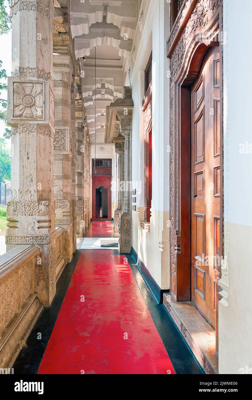 The colonnaded pathway of Temple of the Tooth (Sri Dalada Maligawa) in ...