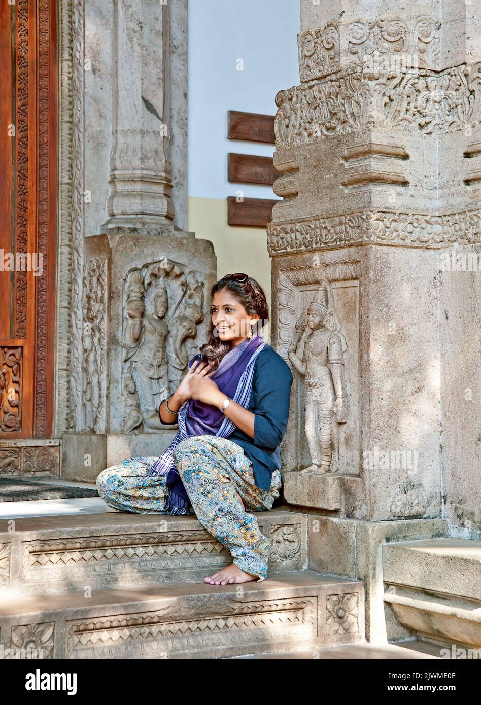 Unidentified pretty pilgrimess at the steps of Temple of the Tooth (Sri ...