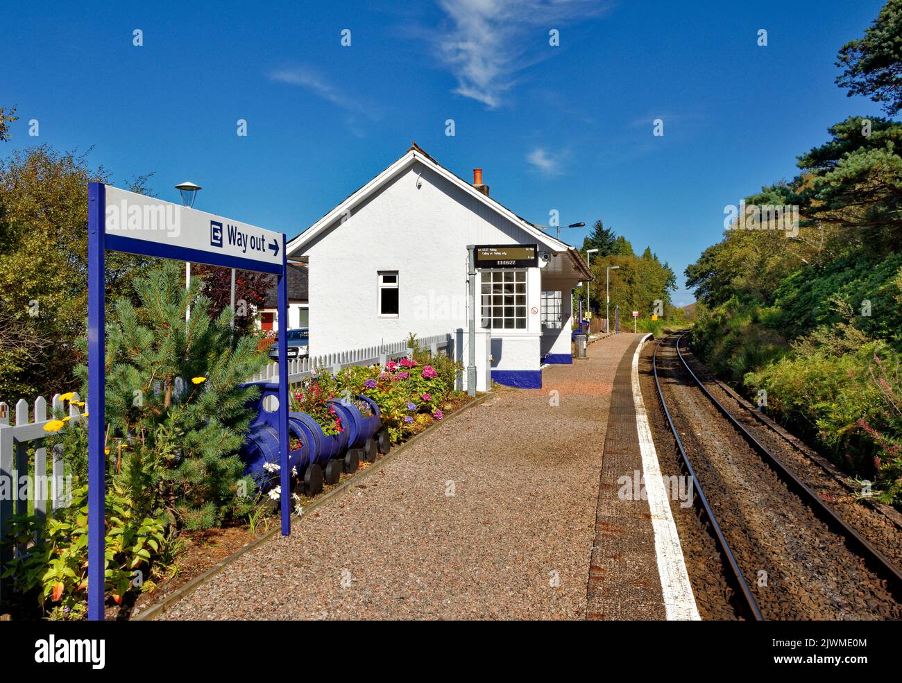 MORAR LOCHABER SCOTLAND THE BUILDINGS AND FLOWER GARDEN OF THE SCOTRAIL ...