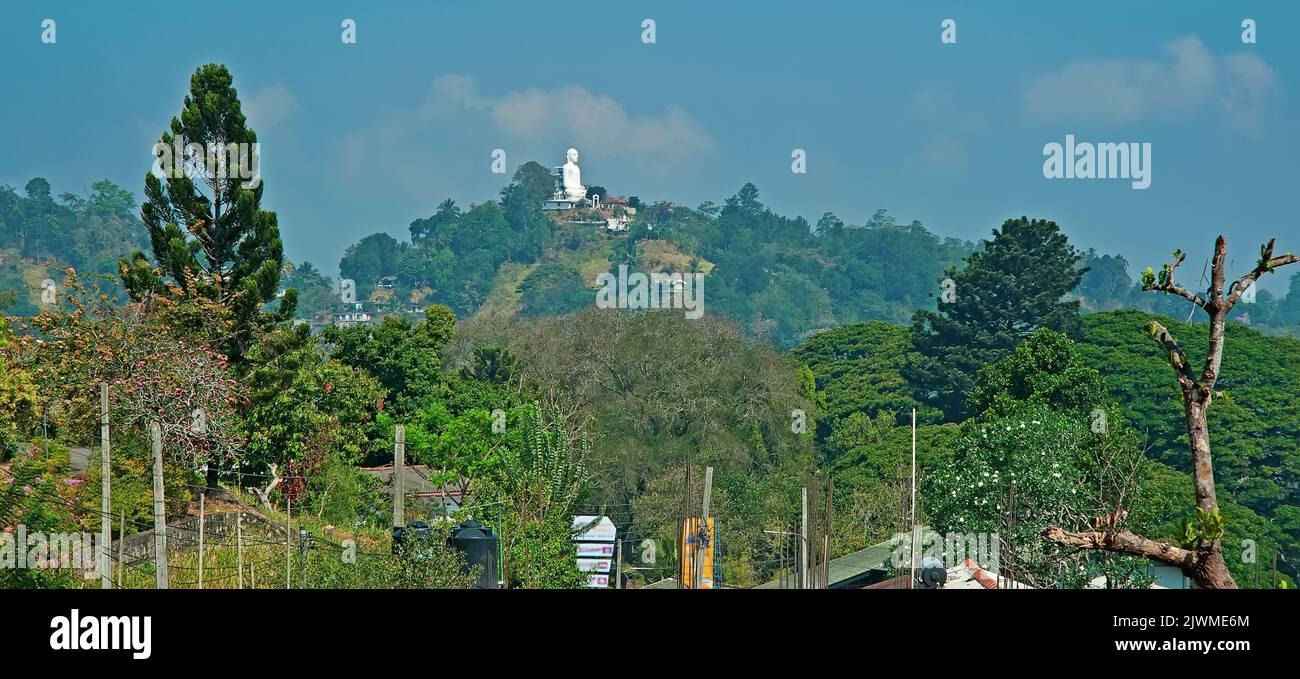 The panorama with distant Bahiravokanda Vihara Buddha Statue in Kandy ...