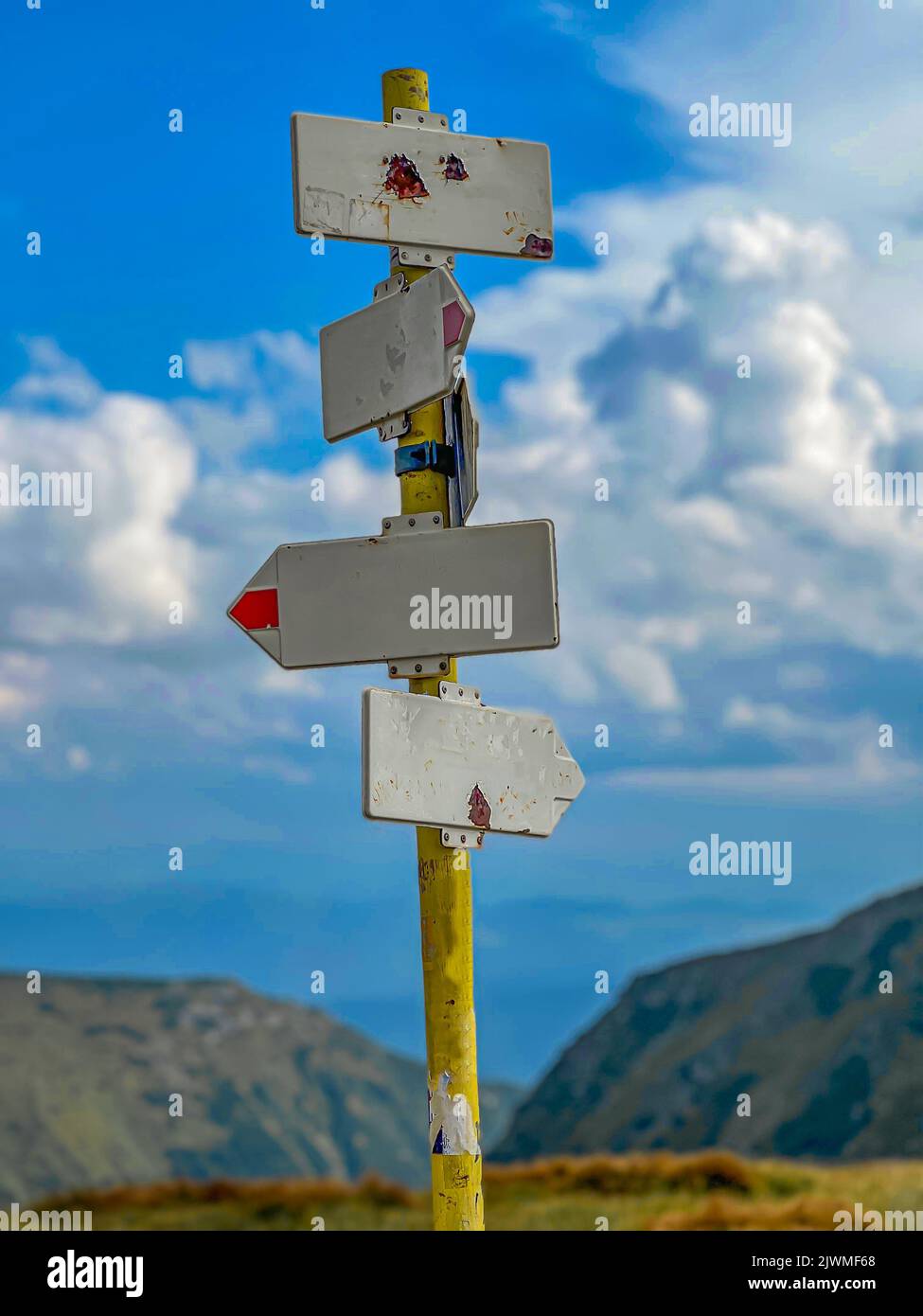 Tourist signs on mountain route Stock Photo - Alamy