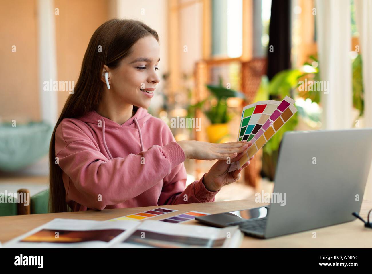 Happy smart teen girl having online design courses with teacher via ...