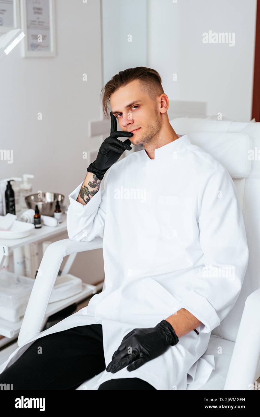 a male doctor in a cosmetology office Stock Photo - Alamy