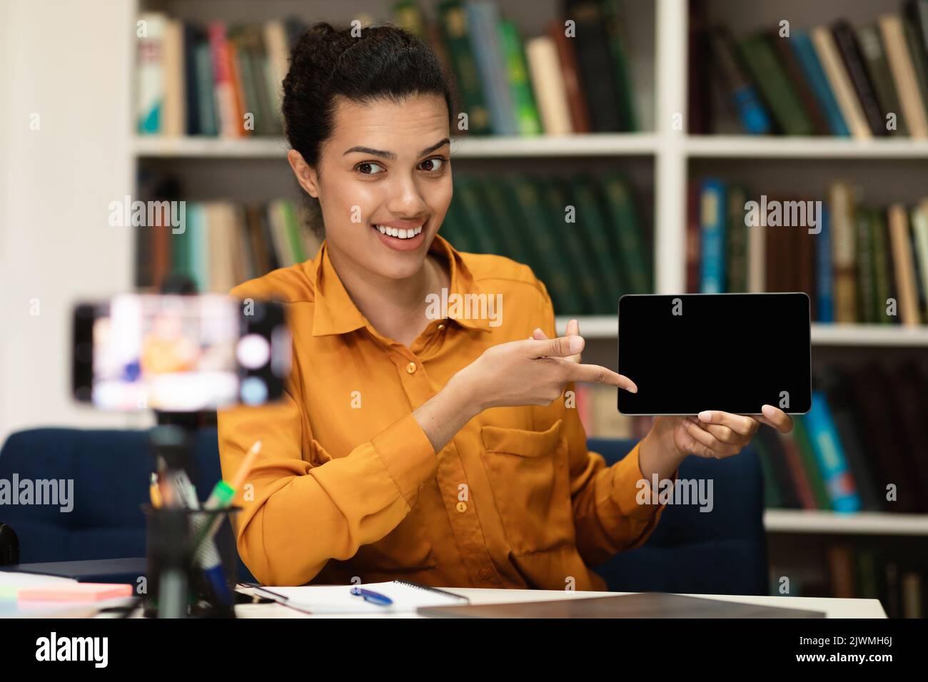 E-Learning concept. Cheerful tutor having video conference using ...