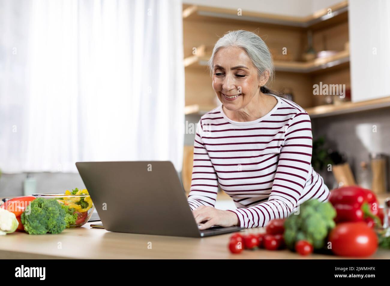 Lady ordering food using hi-res stock photography and images - Alamy