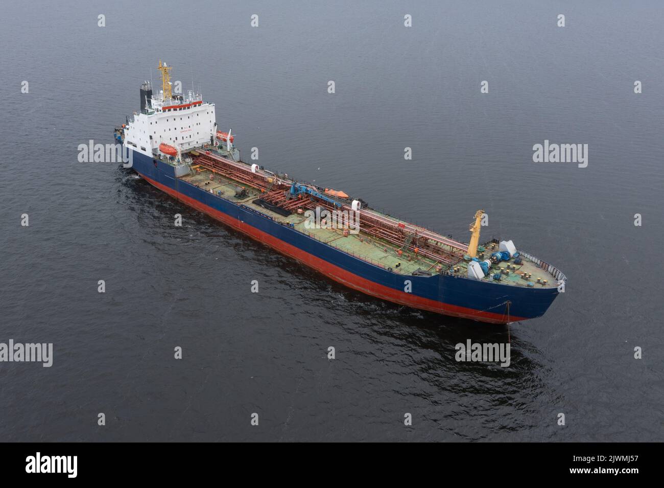 The sea tanker in the middle of a gulf Stock Photo - Alamy