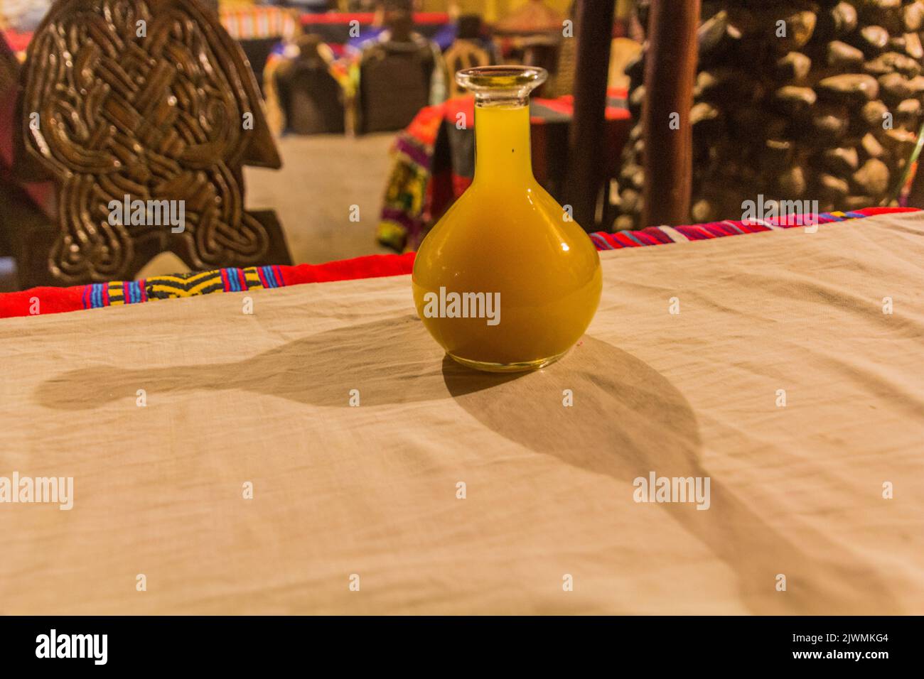 Tej (local honey wine) in a traditional glass, Ethiopia Stock Photo - Alamy