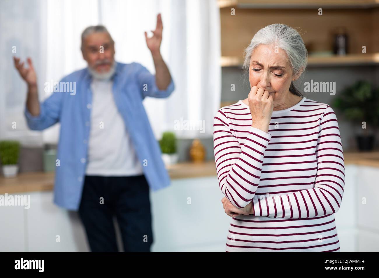 Psychological Abuse. Upset Senior Woman Crying In Kitchen While Arguing ...