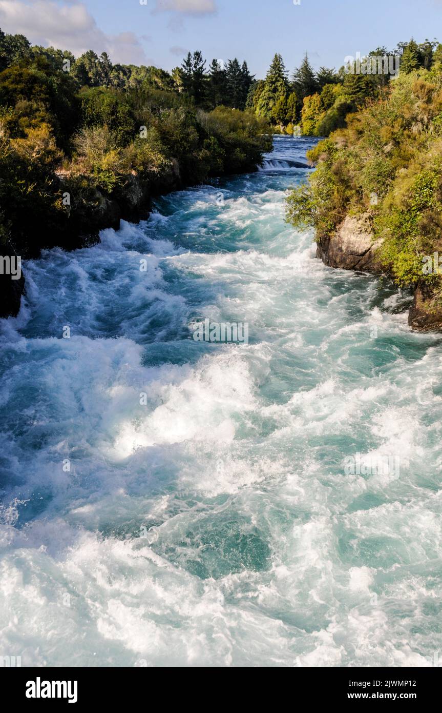 The raging rapids of the Waikato river caught in a narrow canyon or the ...