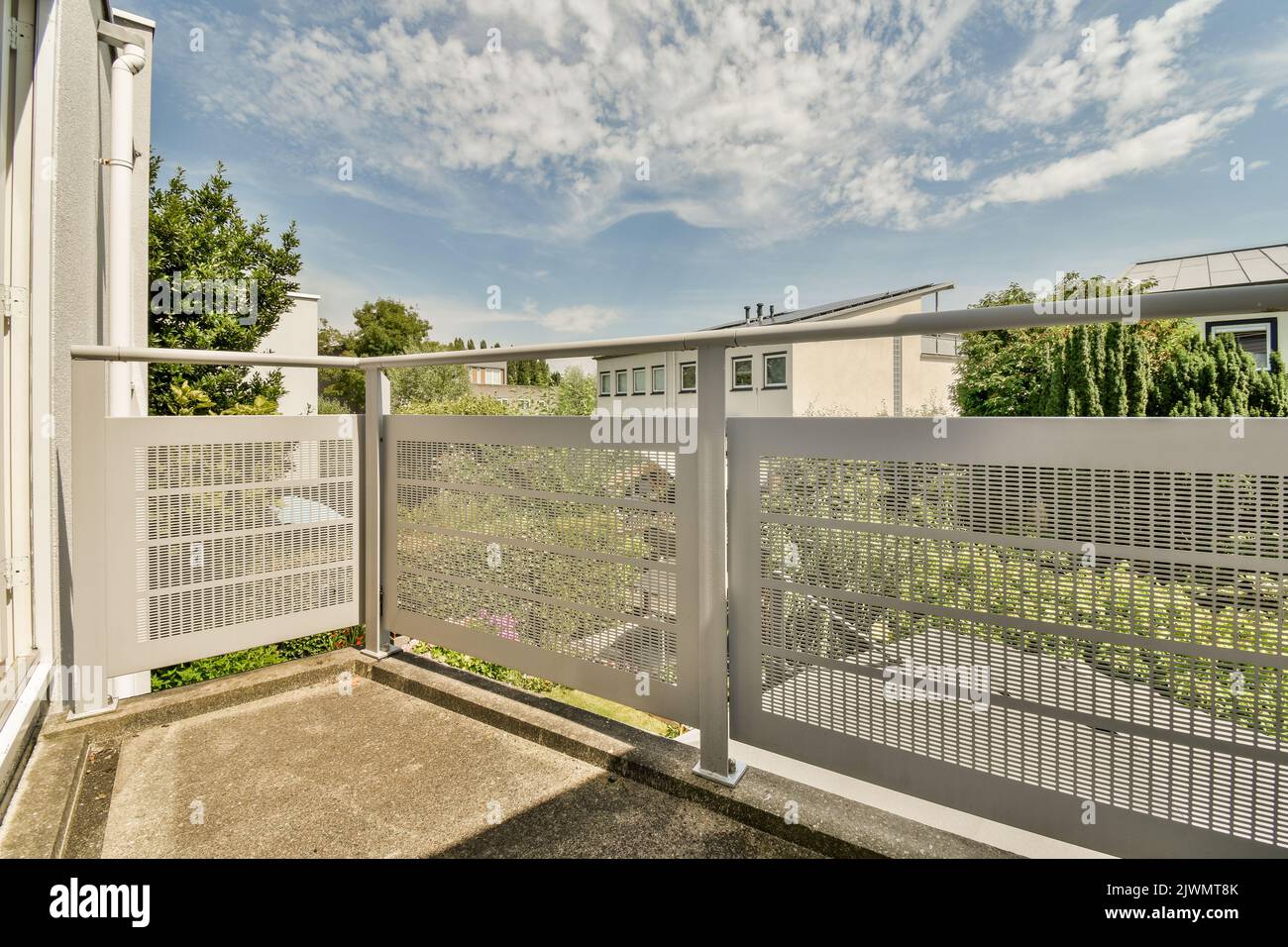 Panoramic view trees from small balcony Stock Photo - Alamy