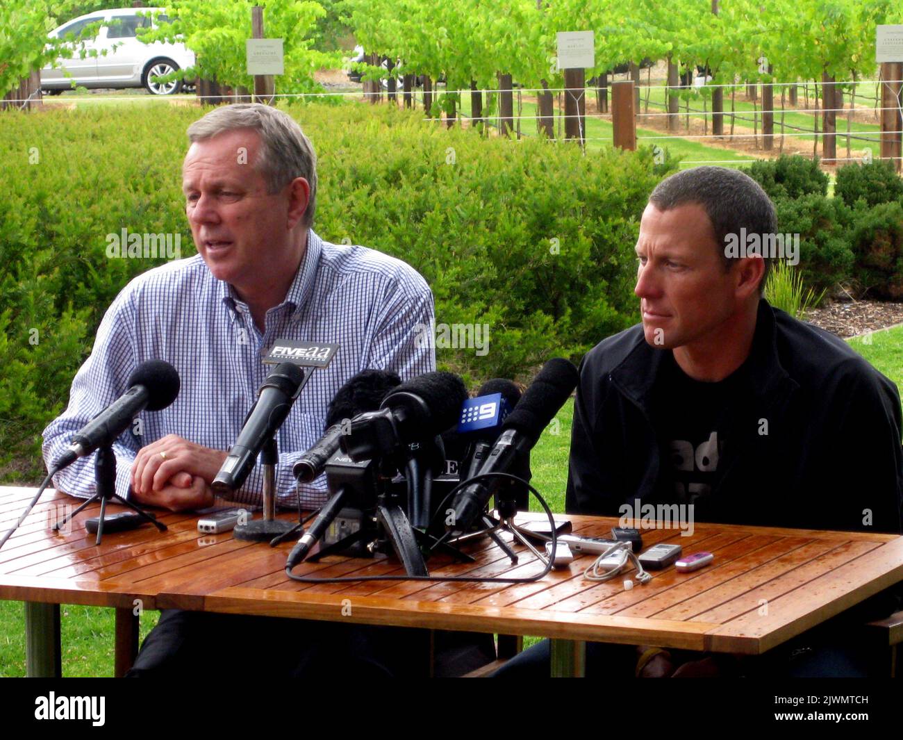 Cycling legend Lance Armstrong (right) and SA Premier Mike Rann talk to ...