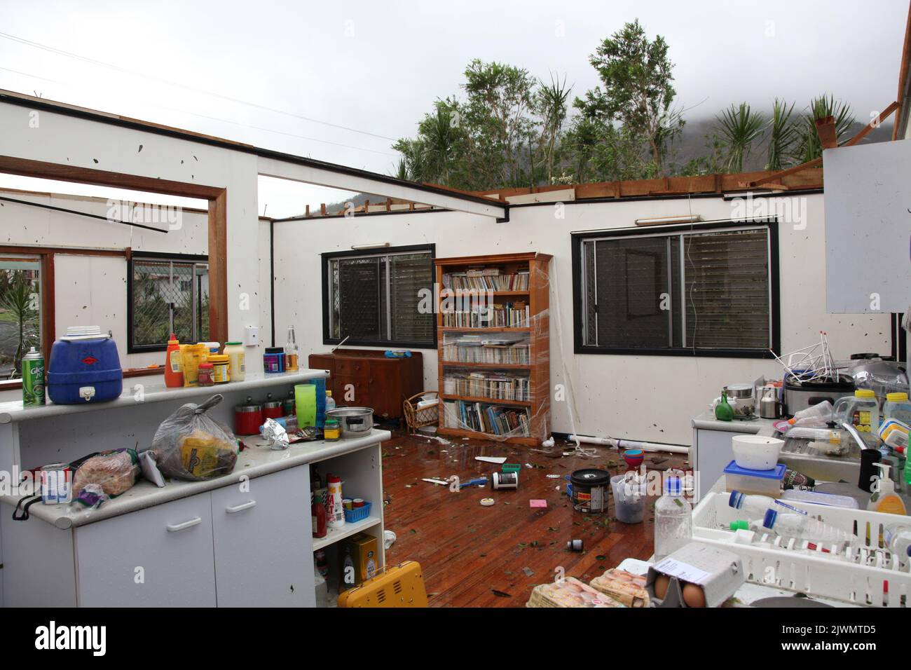 A home is destroyed and its roof ripped off in Tully, as a result of ...
