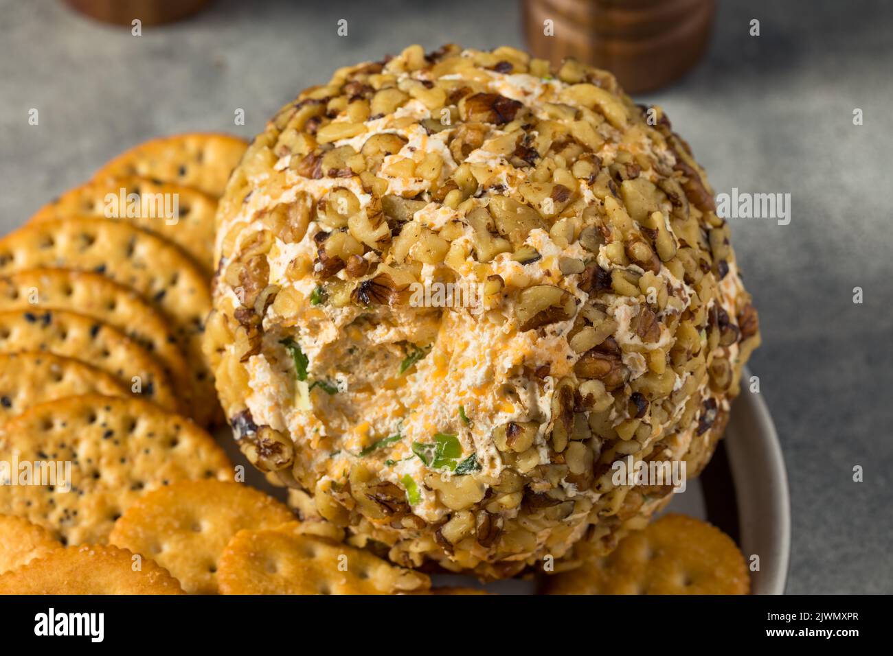 Homemade Creamy Cheese Ball Appetizer with Crackers Stock Photo - Alamy