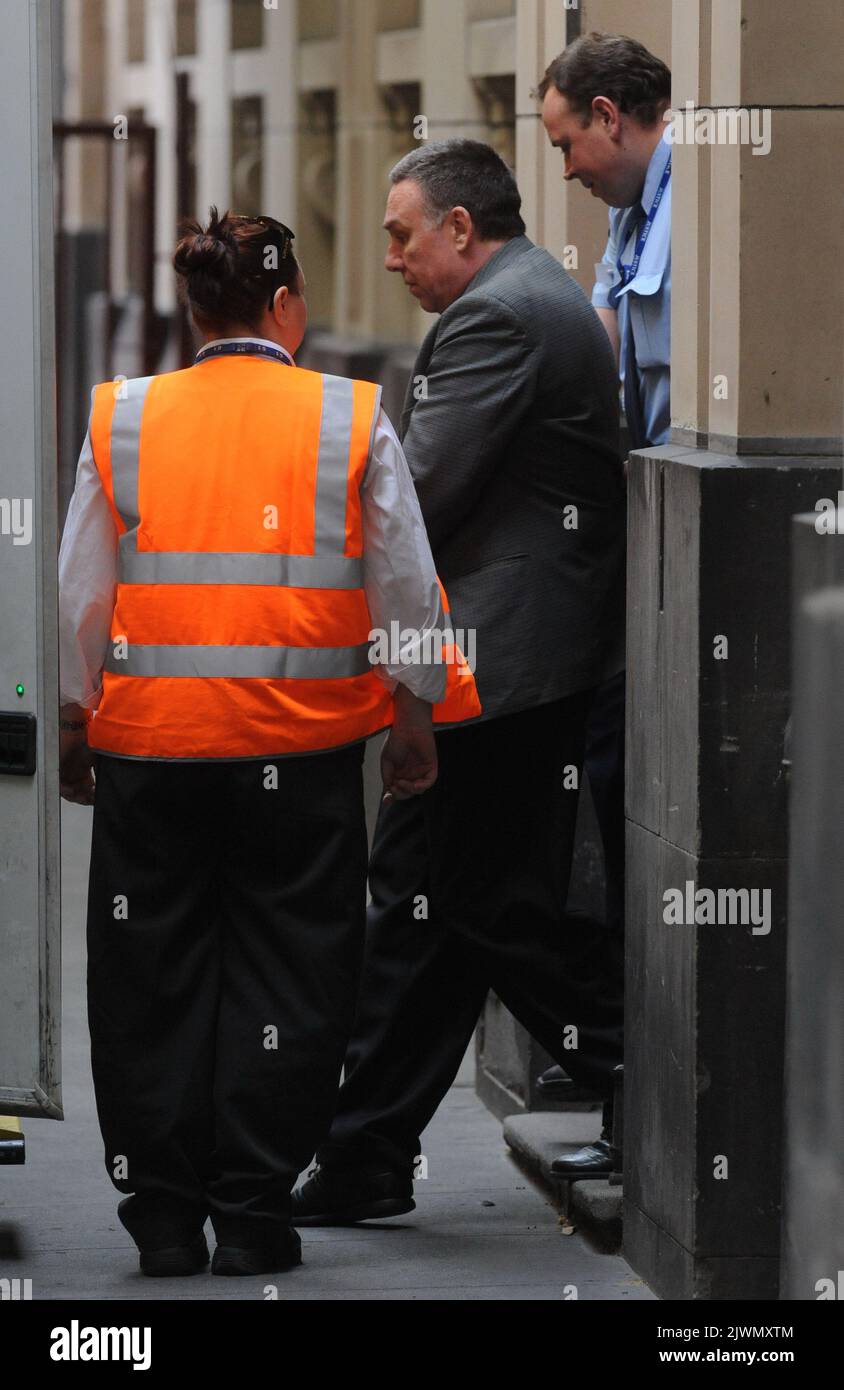 Stephen Hutton is lead from the Supreme Court by security guards in ...