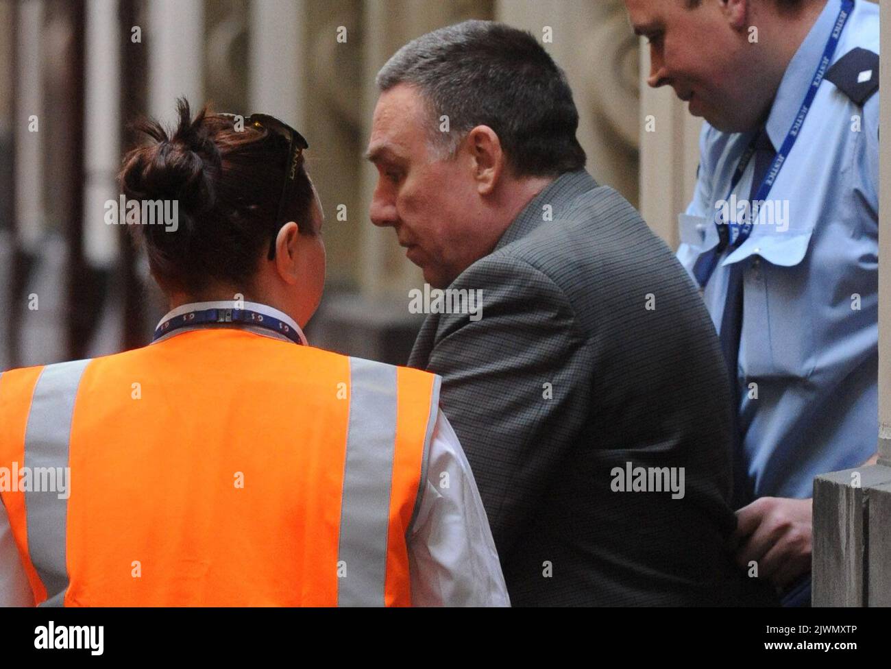 Stephen Hutton is lead from the Supreme Court by security guards in ...