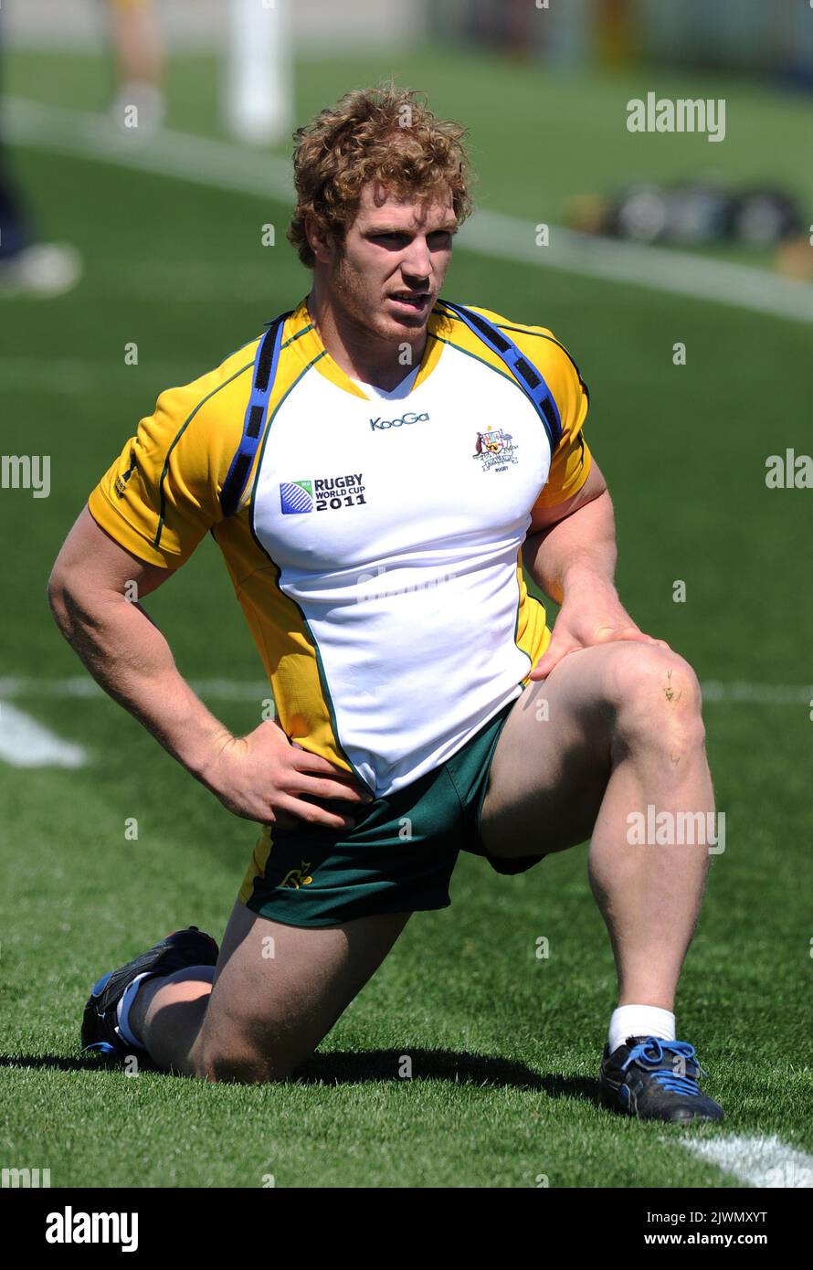Wallabies player David Pocock stretches during the Australian team ...